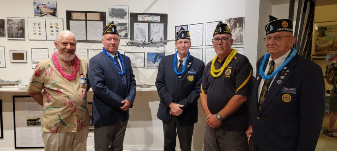 American Legion members help open library display on World War II ...
